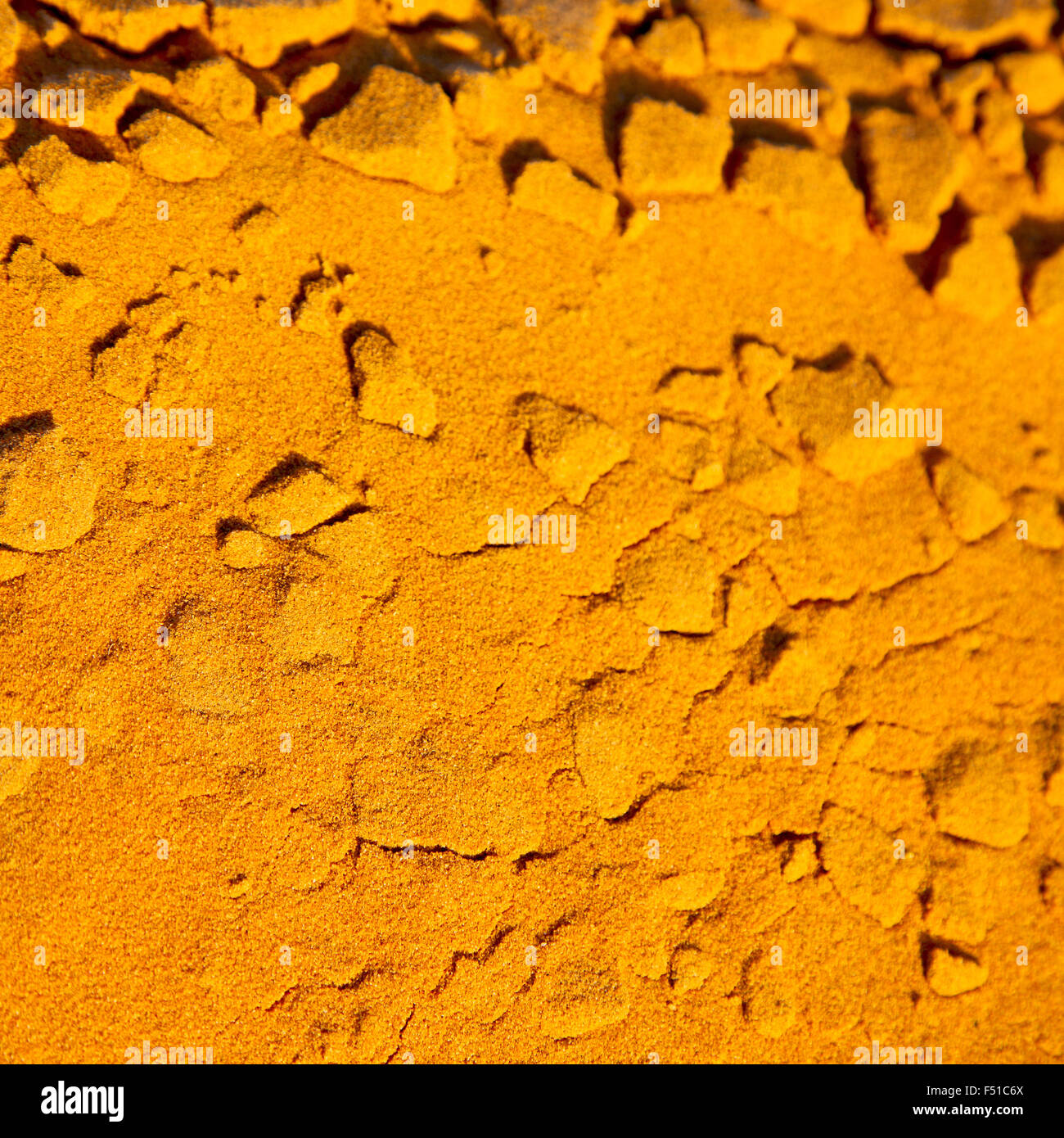 cracked sand in morocco africa desert abstract macro Stock Photo - Alamy