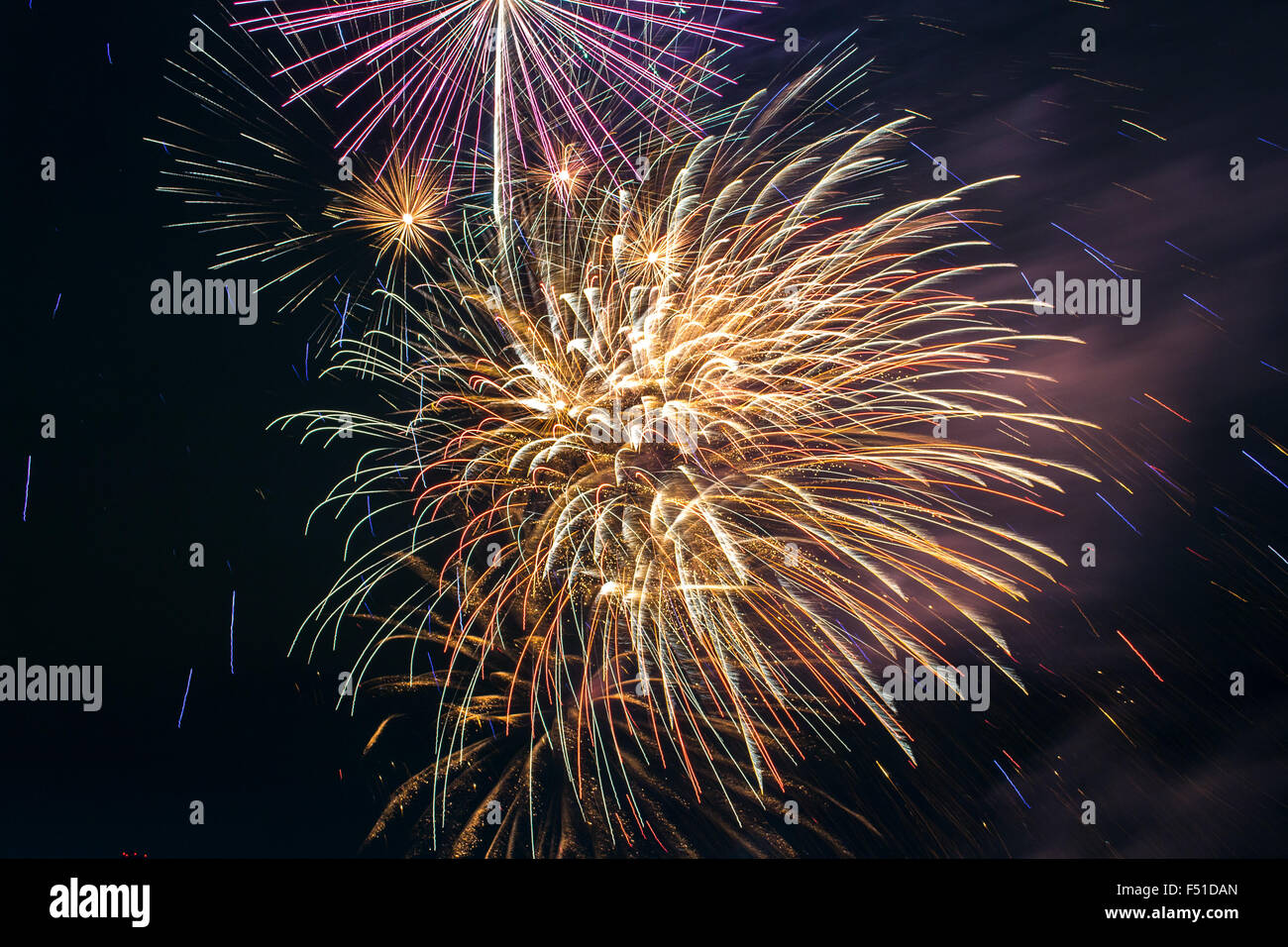 Blur fireworks with night sky Stock Photo - Alamy