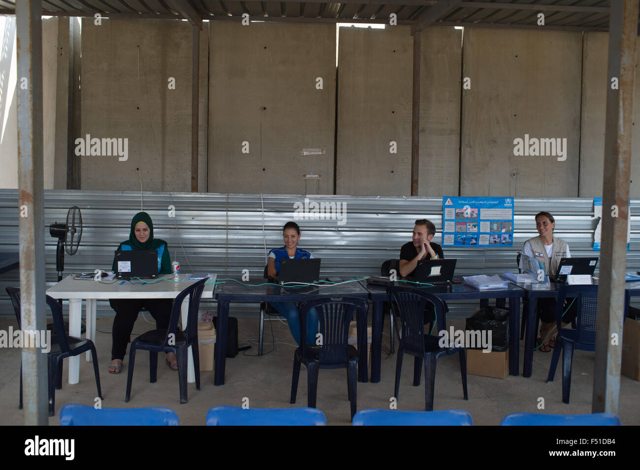 UNHCR staff in Tripoli center for the Akkar region near the syrian ...