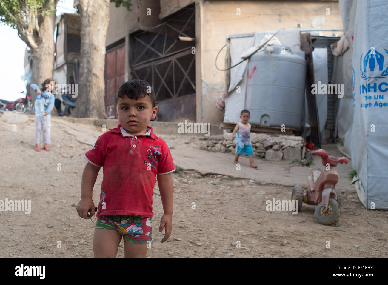 Kids running around the tents in the UN refugee camp near Zahle in the ...
