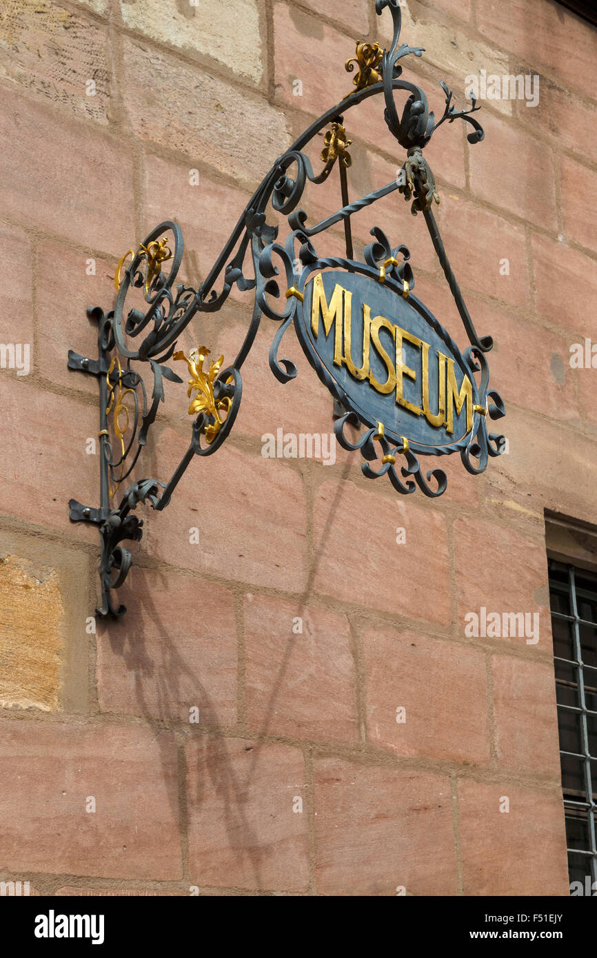 Ornate hanging metalwork sign outside the City Museum Fembohaus of ...