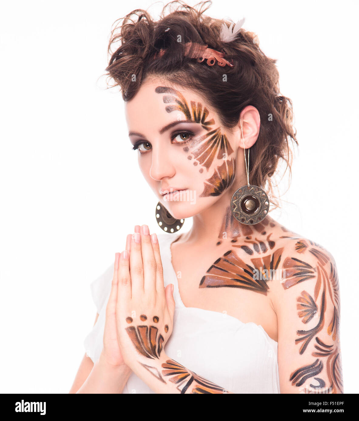 Holiday elf girl praying Stock Photo - Alamy