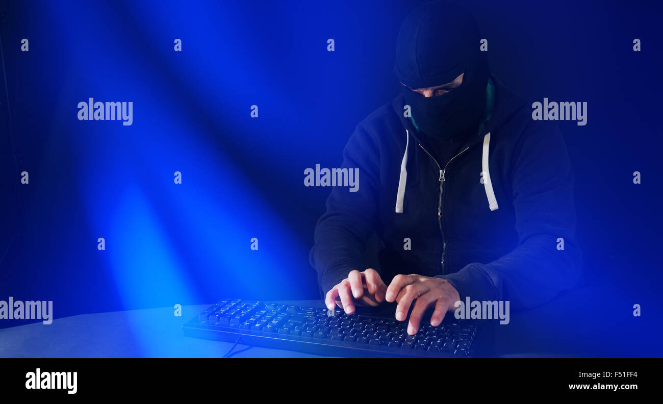 Cyber hacker hacking network blue lights Stock Photo - Alamy
