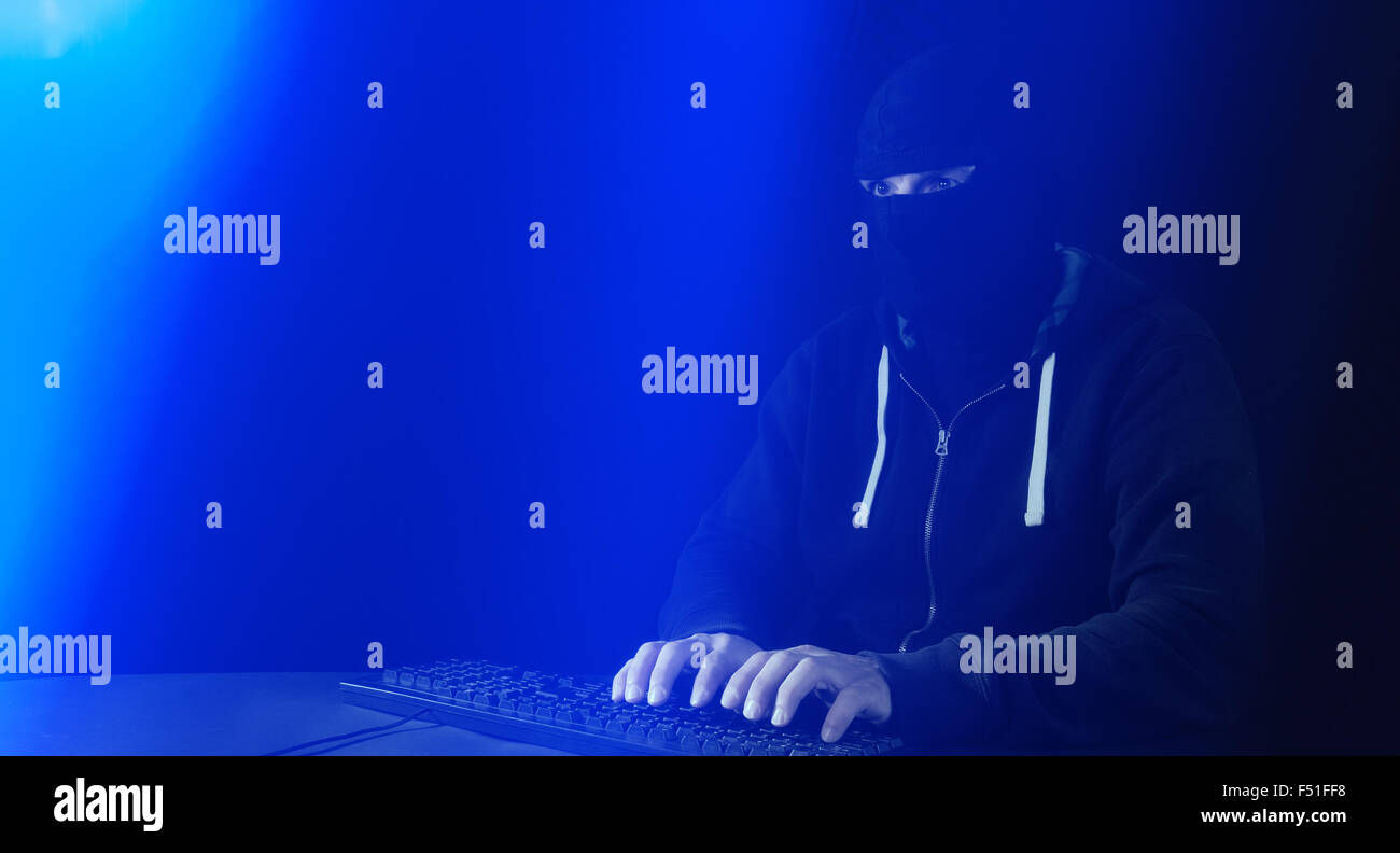 Hacker typing keyboard concept user hi-res stock photography and images ...