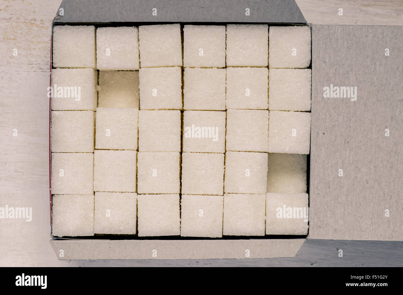 Sugar refined in a cardboard box top view Stock Photo - Alamy