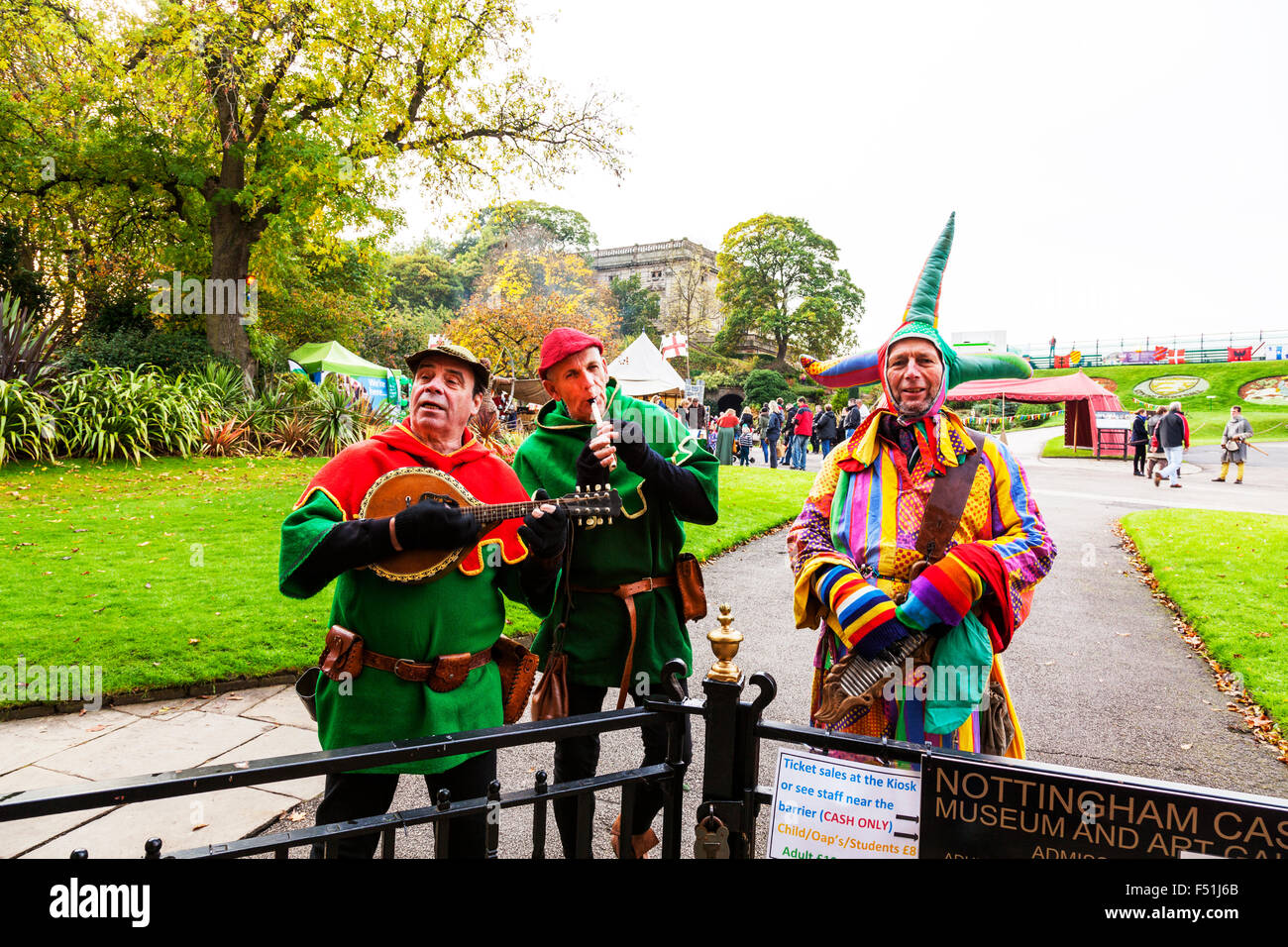 Court jester jesters playing lute flute Nottingham castle entertainers ...