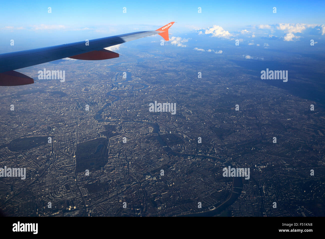 View from aeroplane window of Easyjet logo and wingtip flying over ...