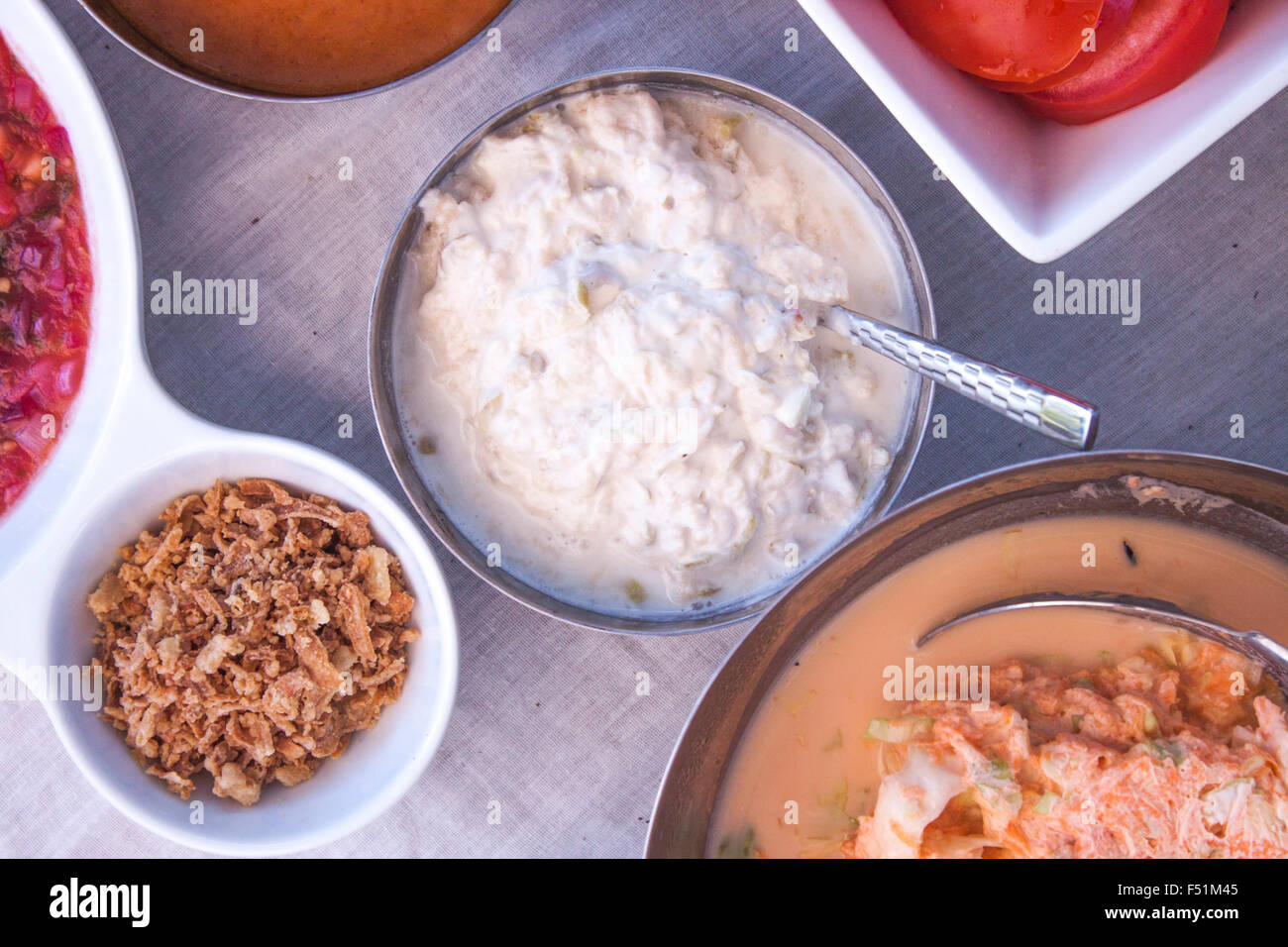 Apple mayonnaise salad, between other salsa, dried onions, tomatos and ...