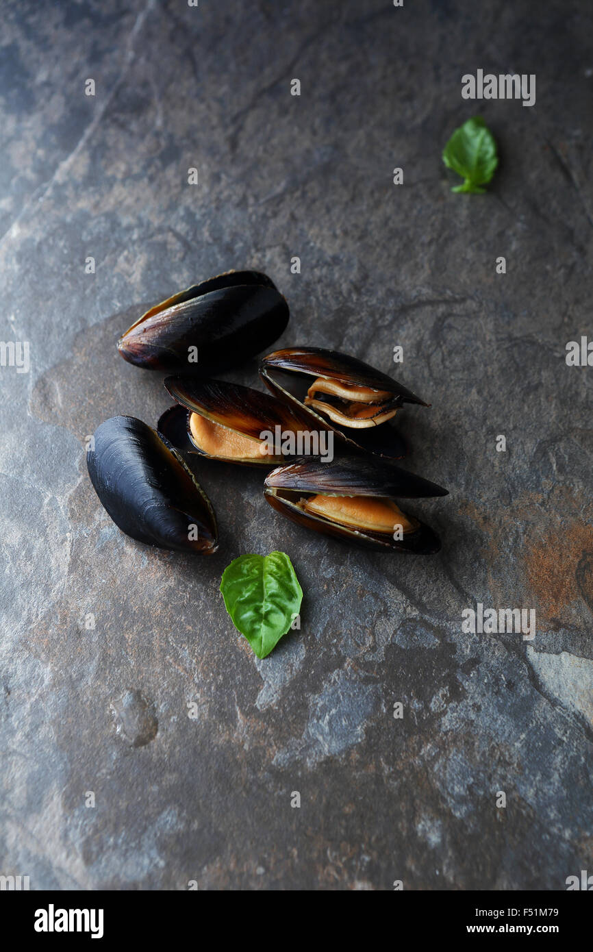 cooking seafood, mussels in shell, food top view Stock Photo - Alamy
