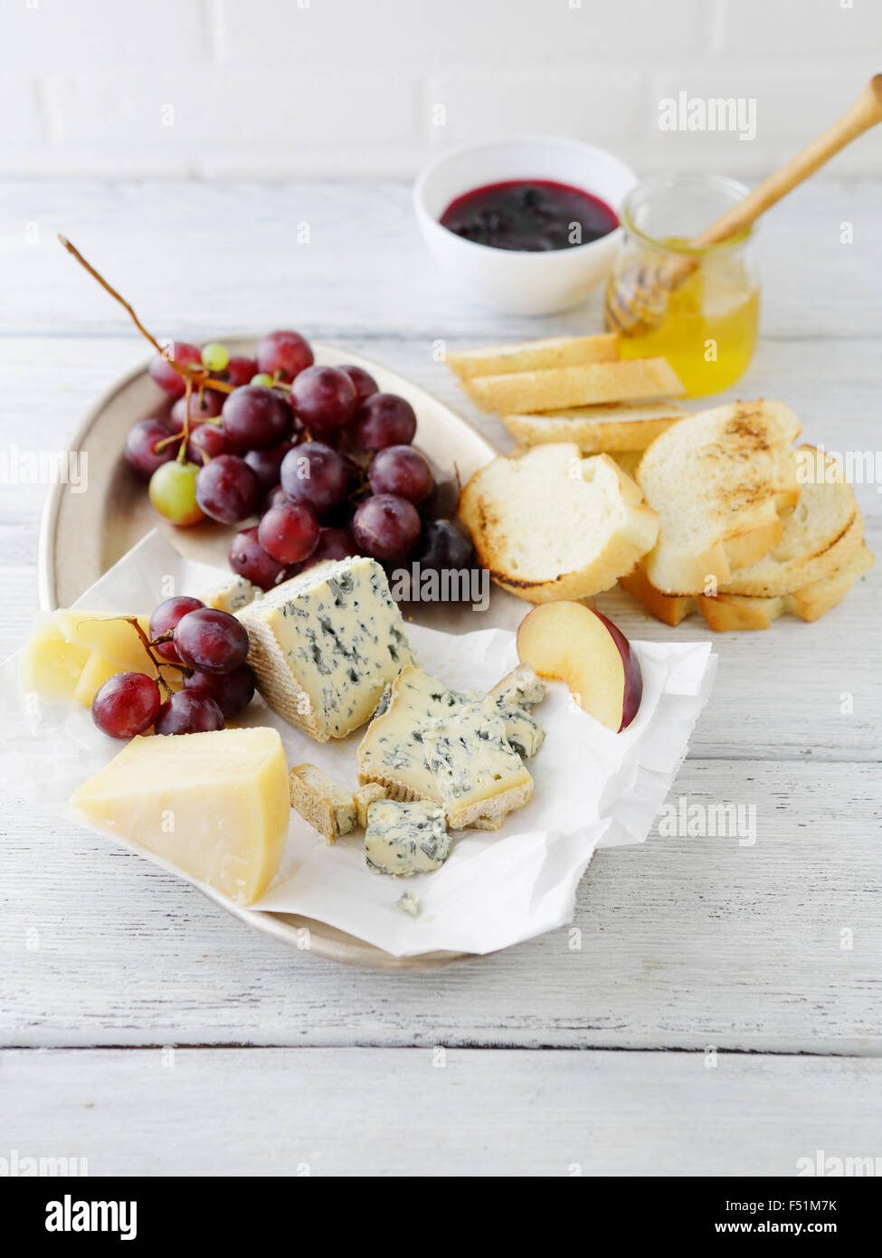 breakfast composition with cheese and grapes, food closeup Stock Photo ...