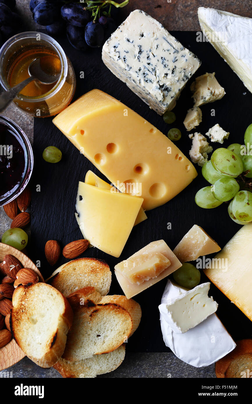 delicatessen cheses with fruits, food top Stock Photo - Alamy