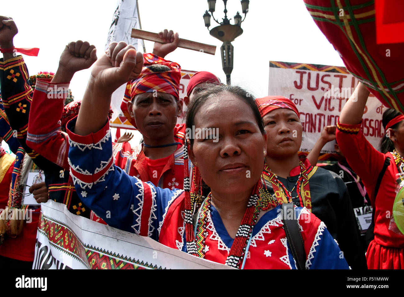 Philippines. 26th Oct, 2015. Lumad tribe members raise their fists in ...