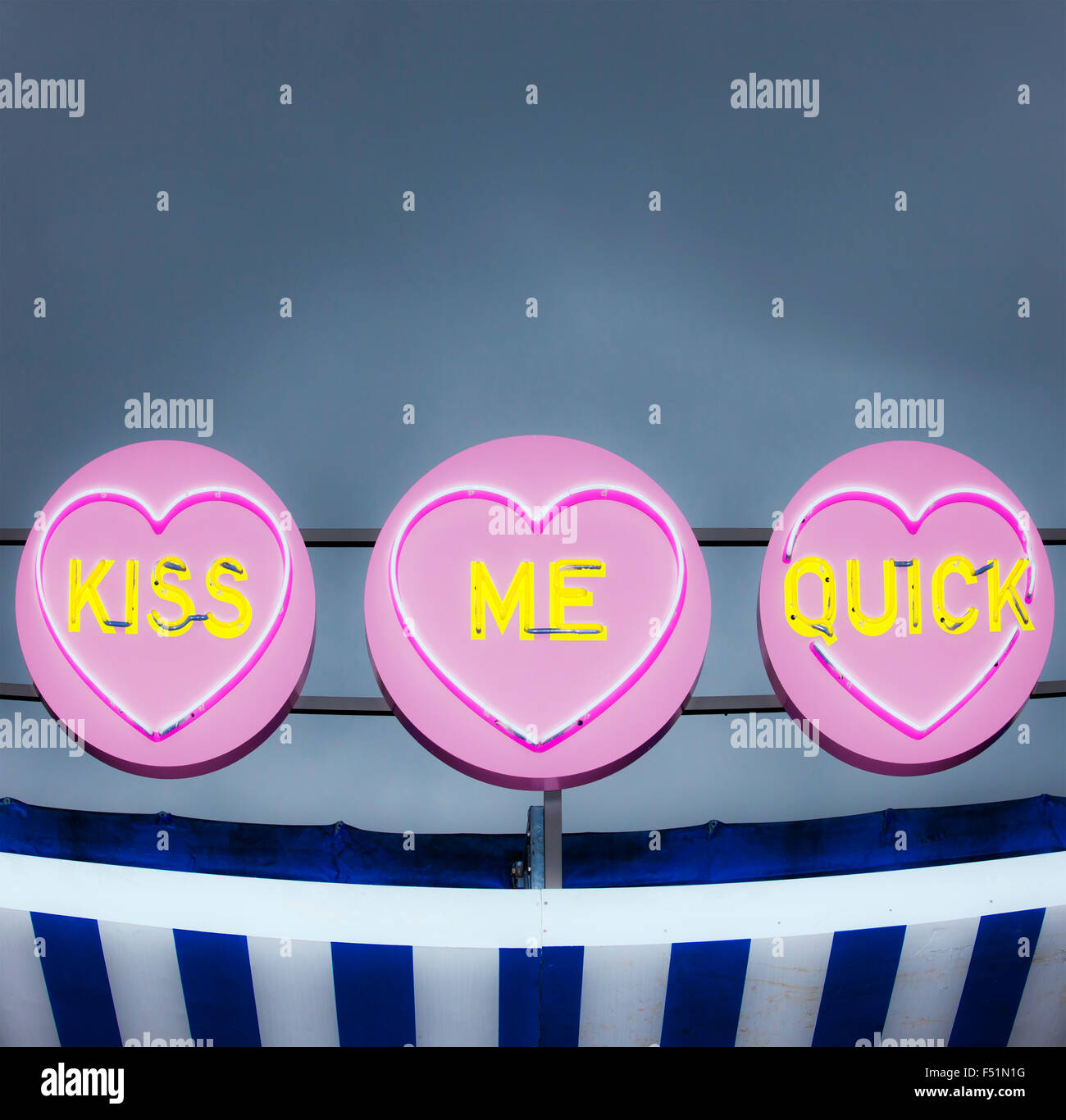 Kiss Me Quick neon sign Stock Photo - Alamy