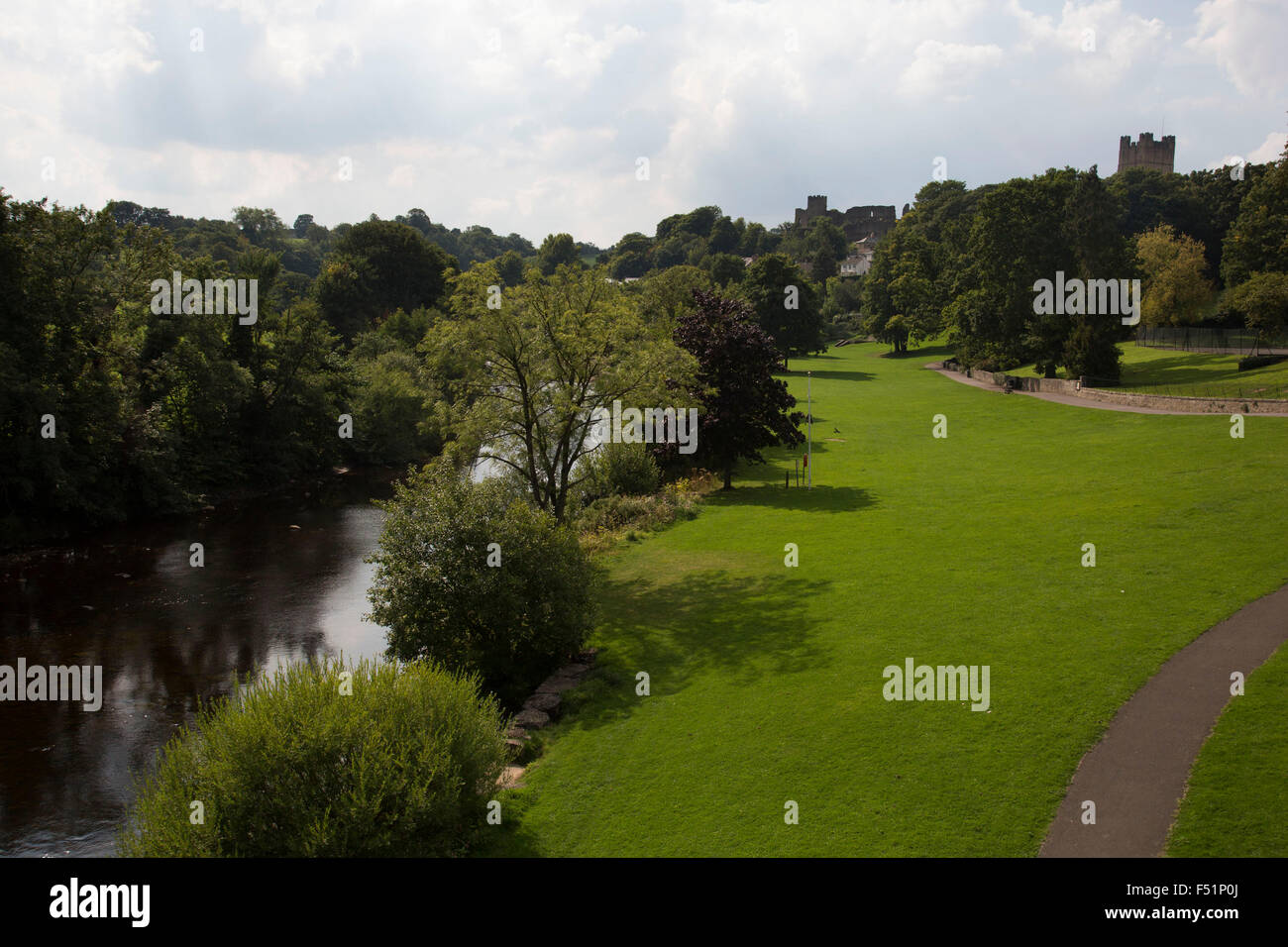 Park looking north along the River Swale towards Richmond Castle ...