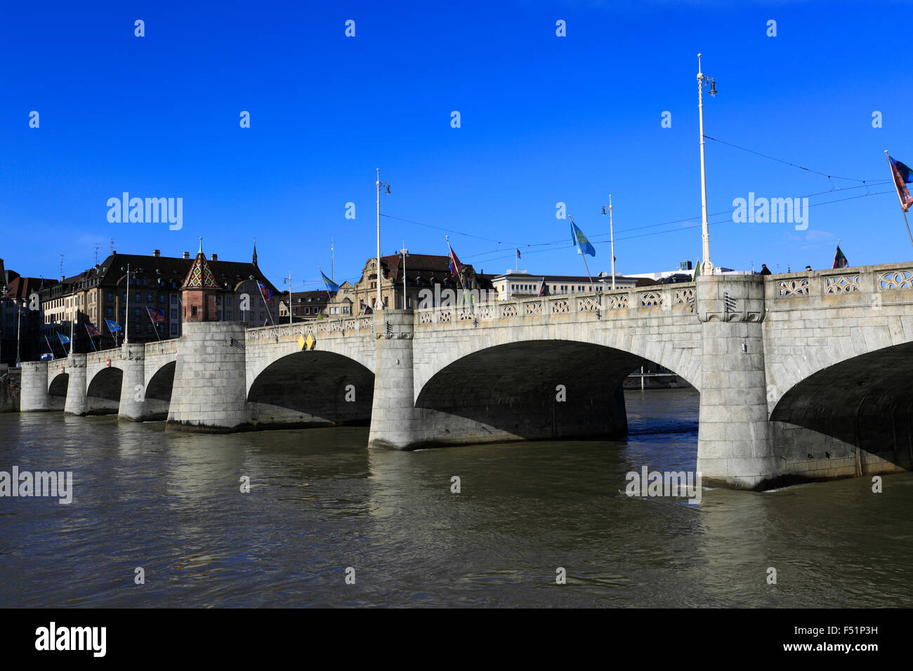 The medieval Mittlere Brücke stone bridge over the river Rhine, city of ...