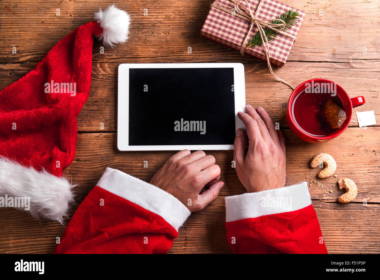 Santa Claus with tablet Stock Photo - Alamy