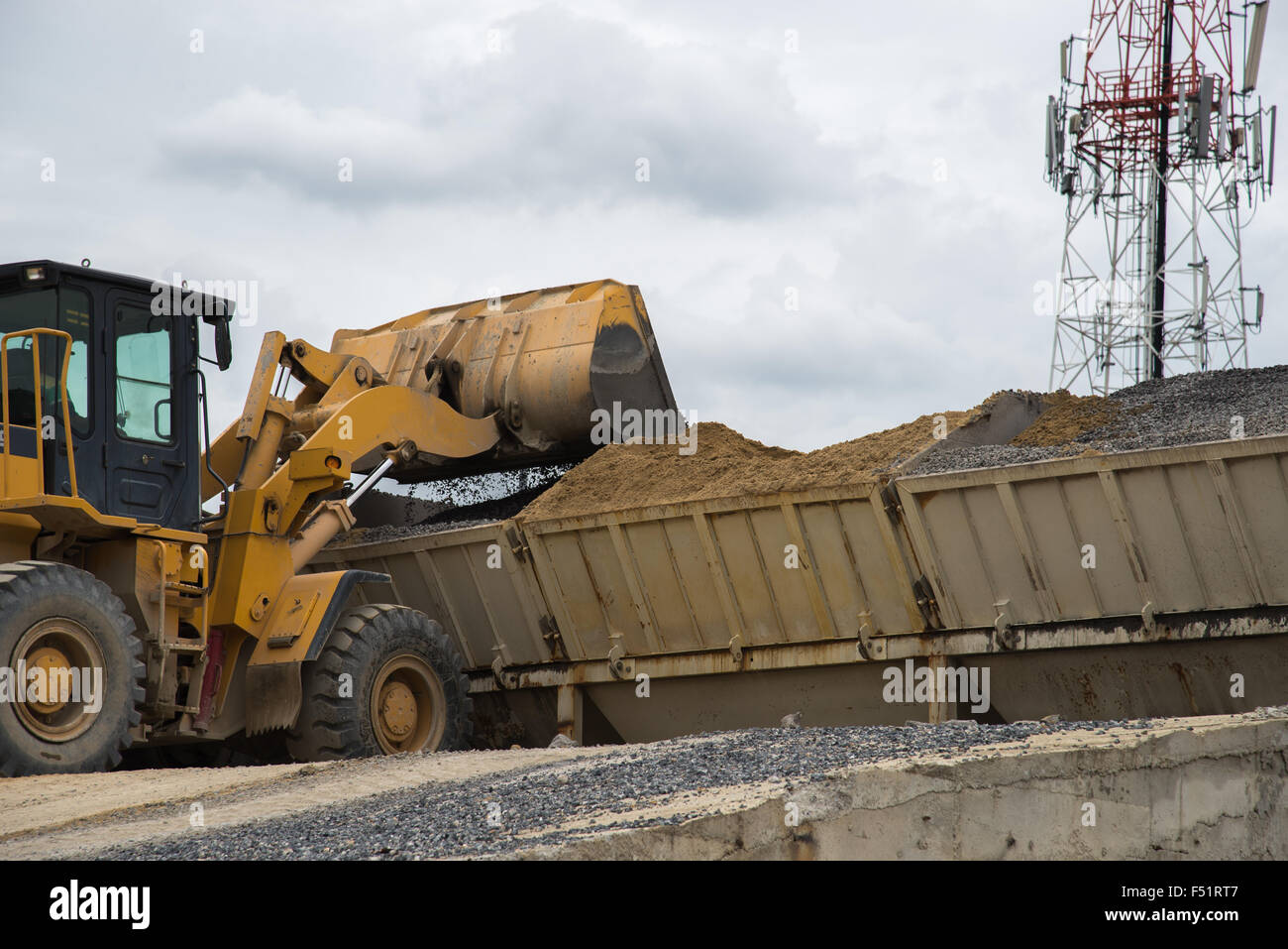 Excavator unloading hi-res stock photography and images - Alamy