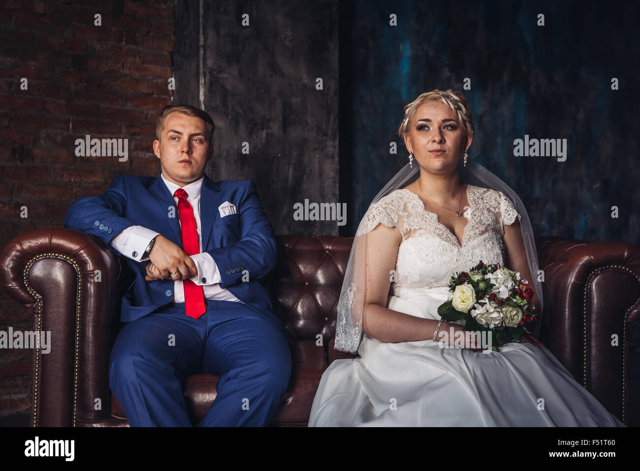 beautiful young couple suit on a dark background Stock Photo - Alamy