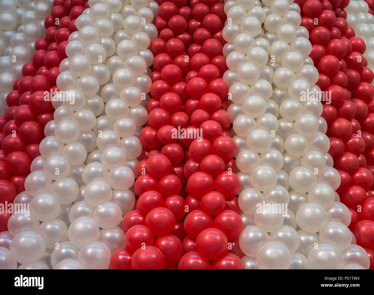 Red and white party balloons Stock Photo - Alamy