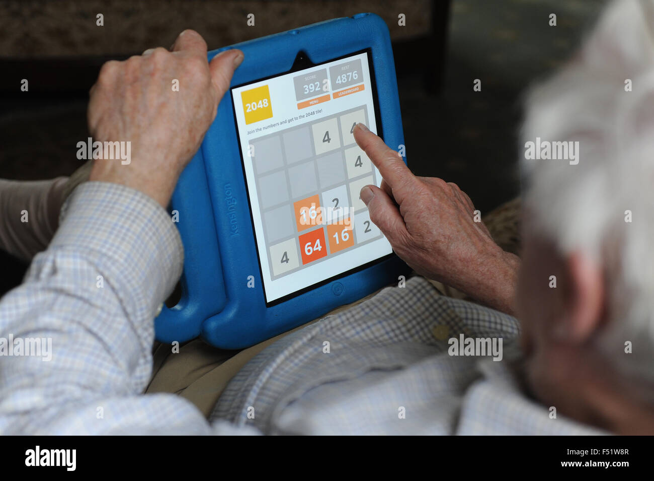 Older man playing computer game hi-res stock photography and images - Alamy