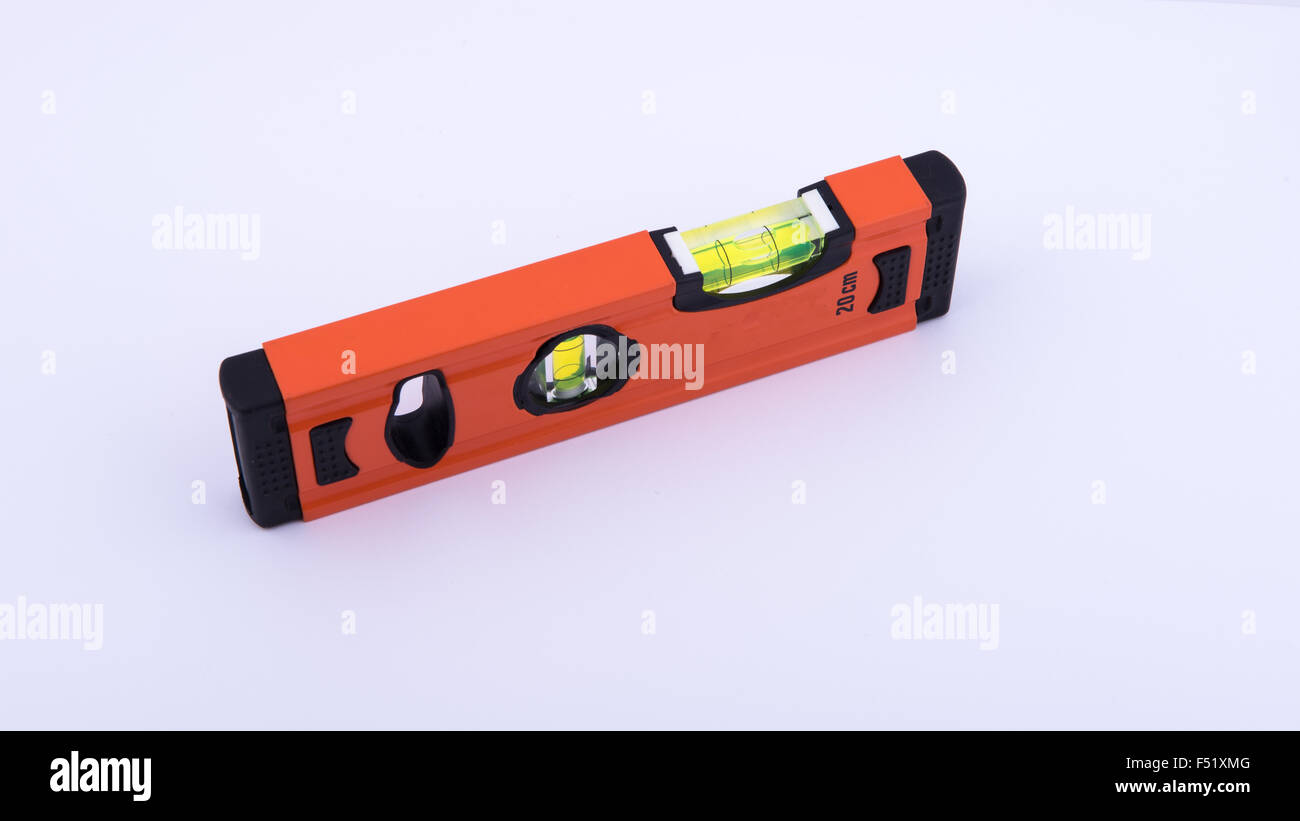 level tool in orange on white background Stock Photo - Alamy