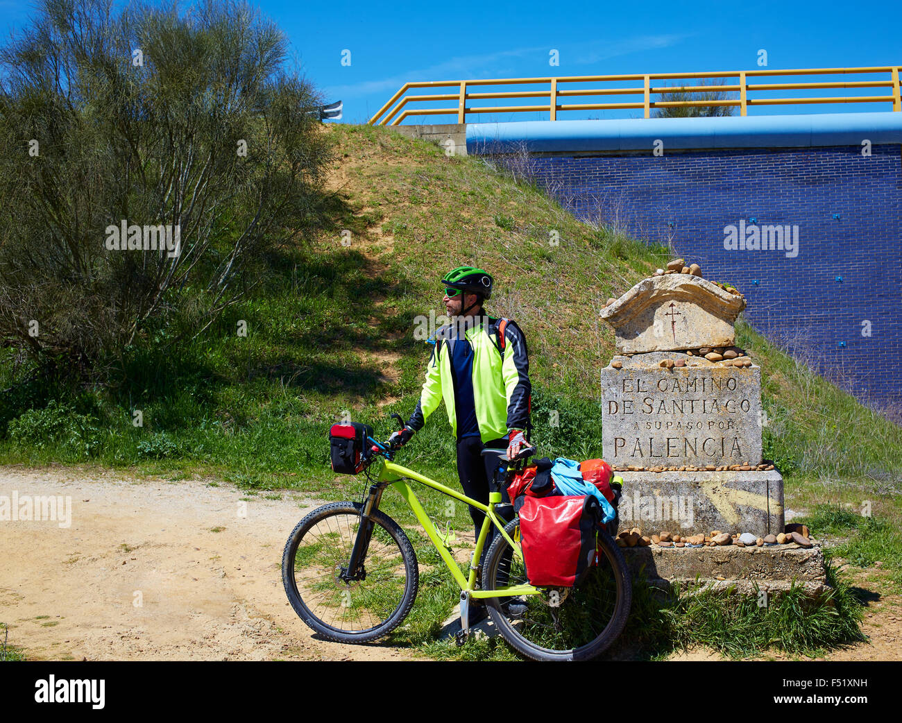 The way of saint James biker at stone sign Palencia Spain Stock Photo ...