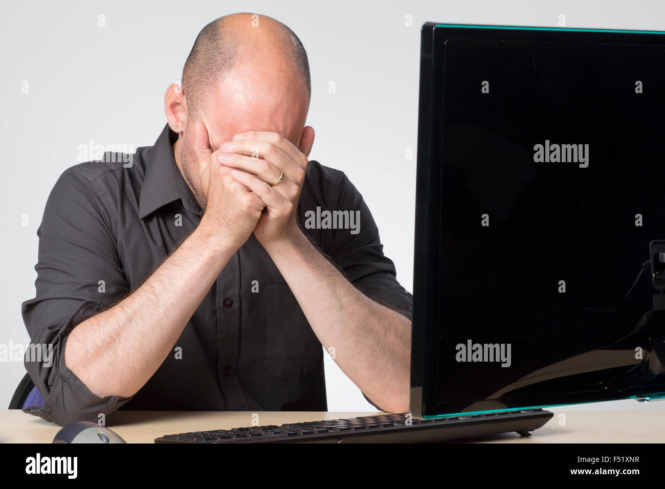 Stressed office worker Stock Photo - Alamy