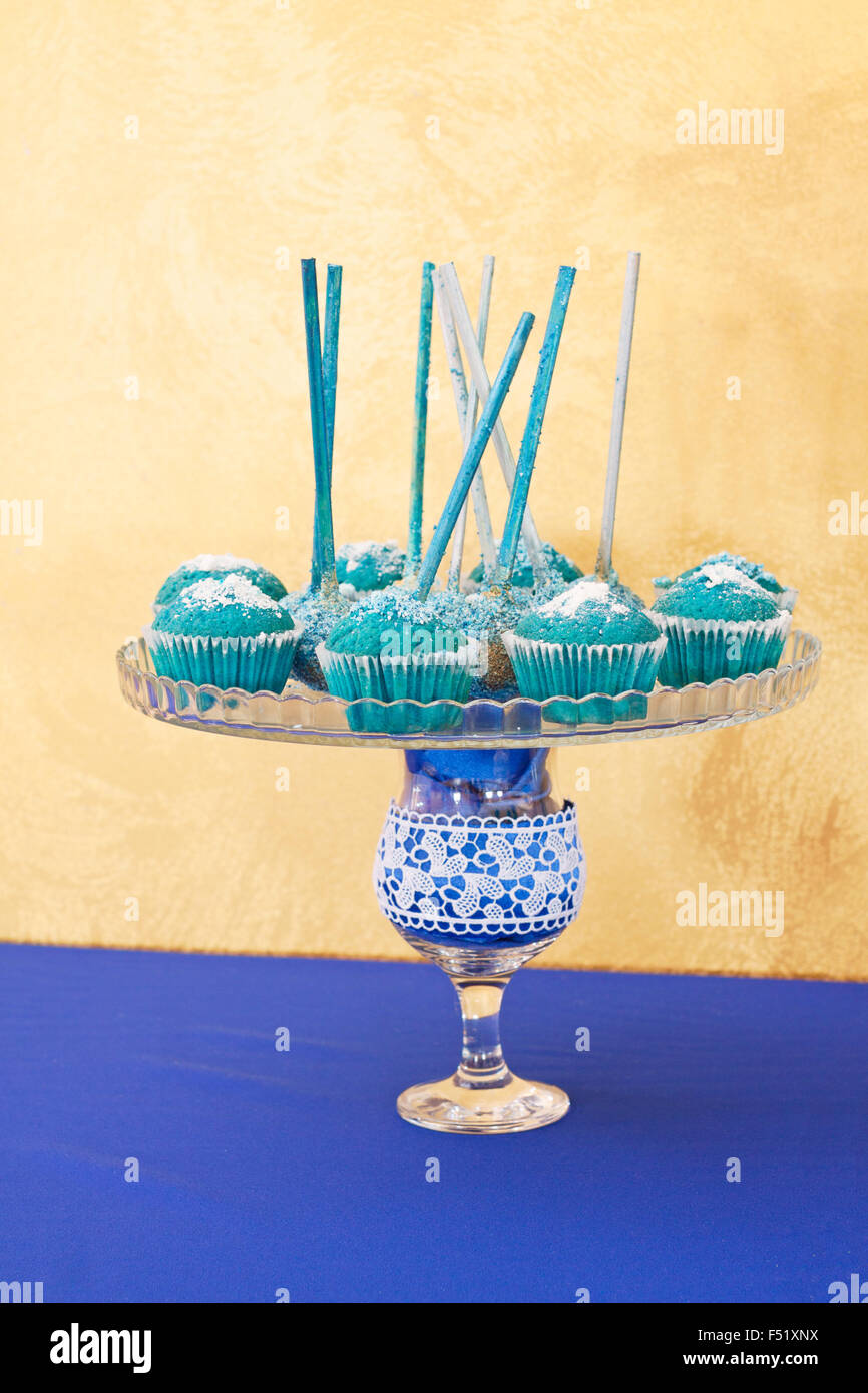 Blue cupcakes and cake pops Stock Photo - Alamy