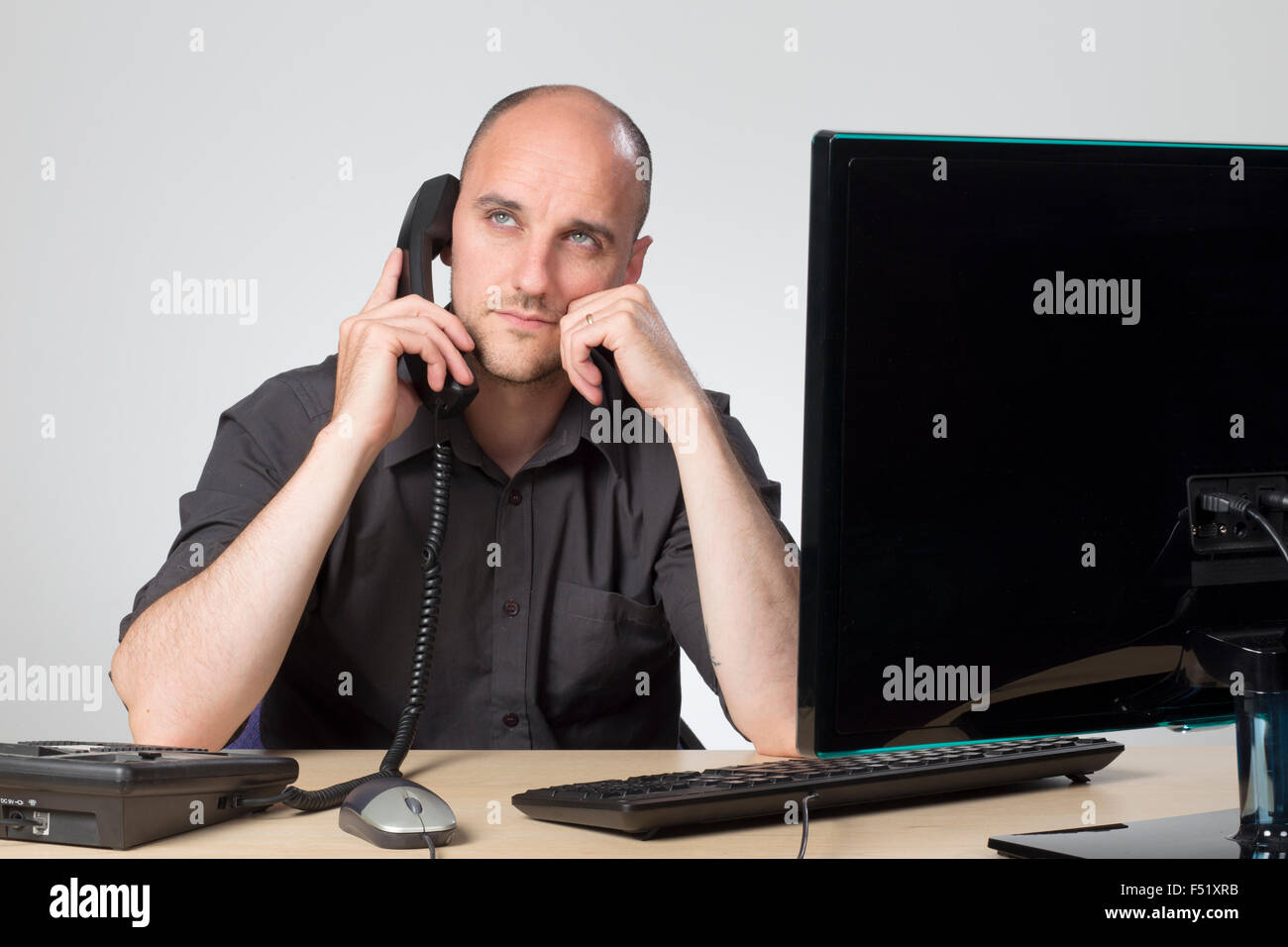 Bored on the phone Stock Photo - Alamy