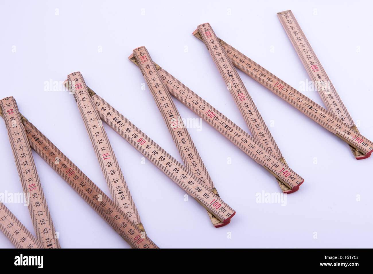 folding rule on white background Stock Photo - Alamy