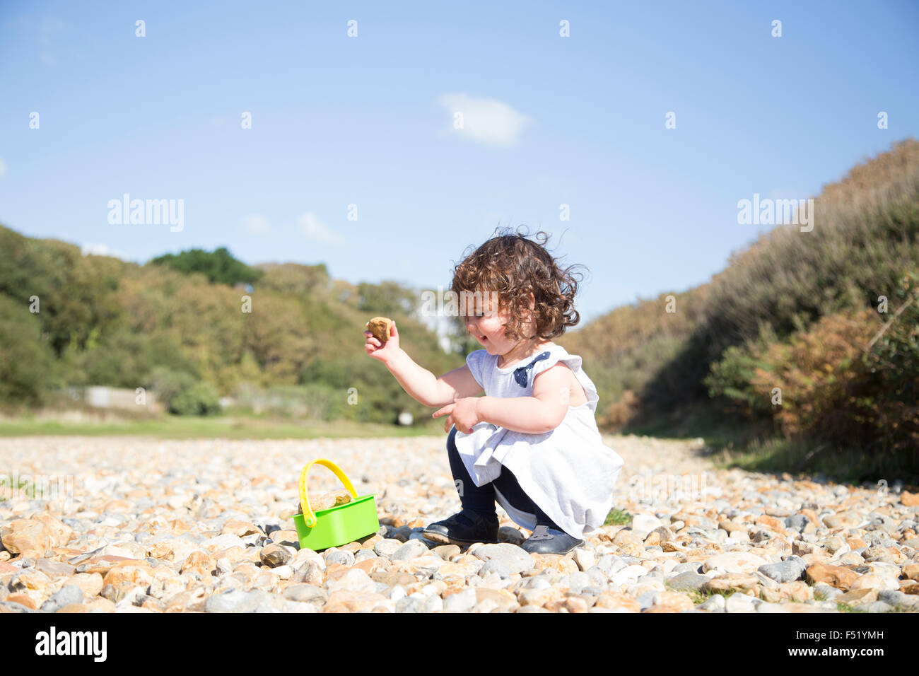 Collecting stone child hi-res stock photography and images - Alamy