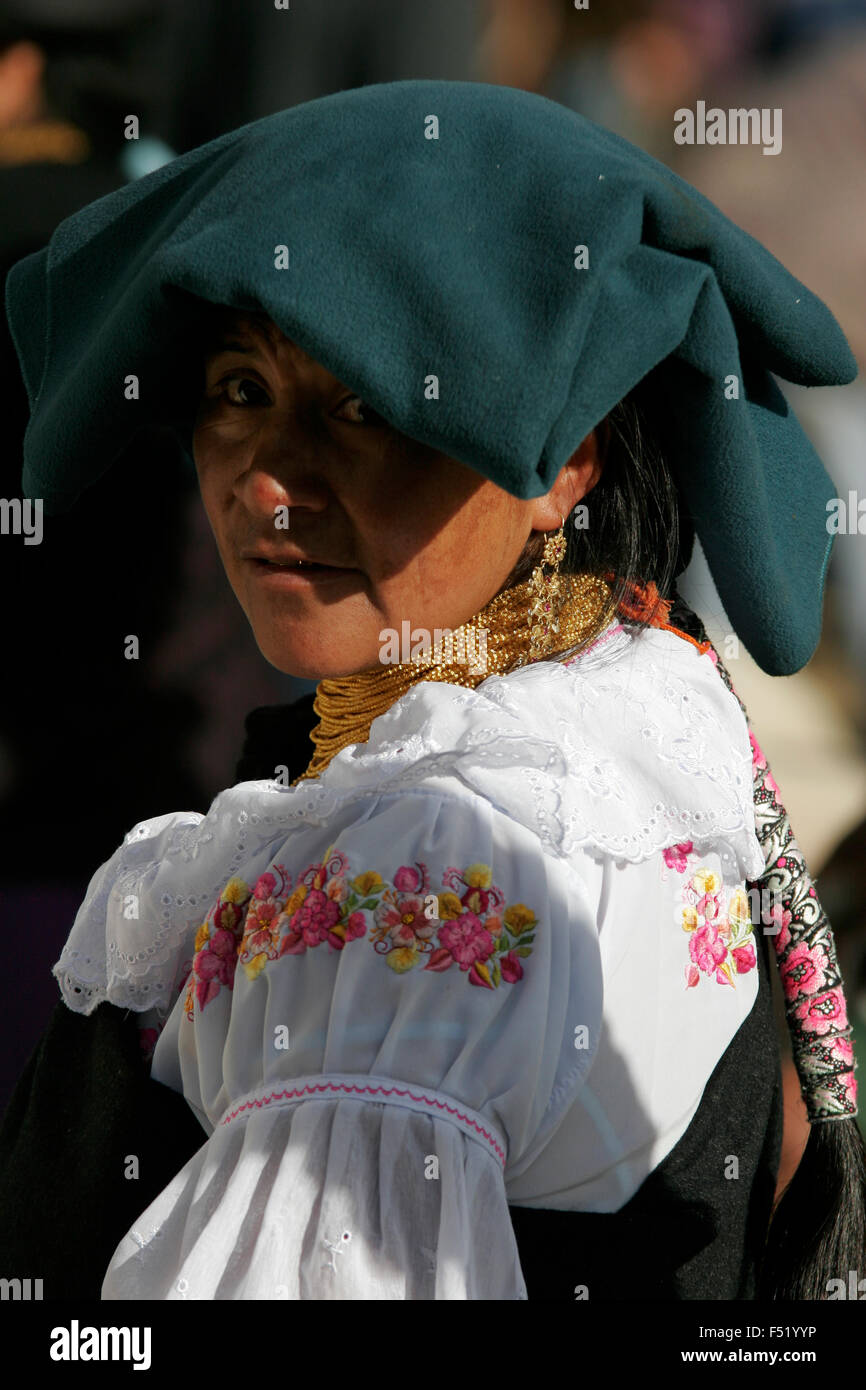 Indigenous woman wearing traditional dress at Otavalo market, Ecuador ...