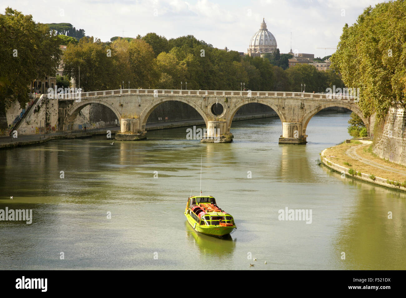Tourist boat on the river Tiber, Rome, Italy with the Ponte Sisto and ...