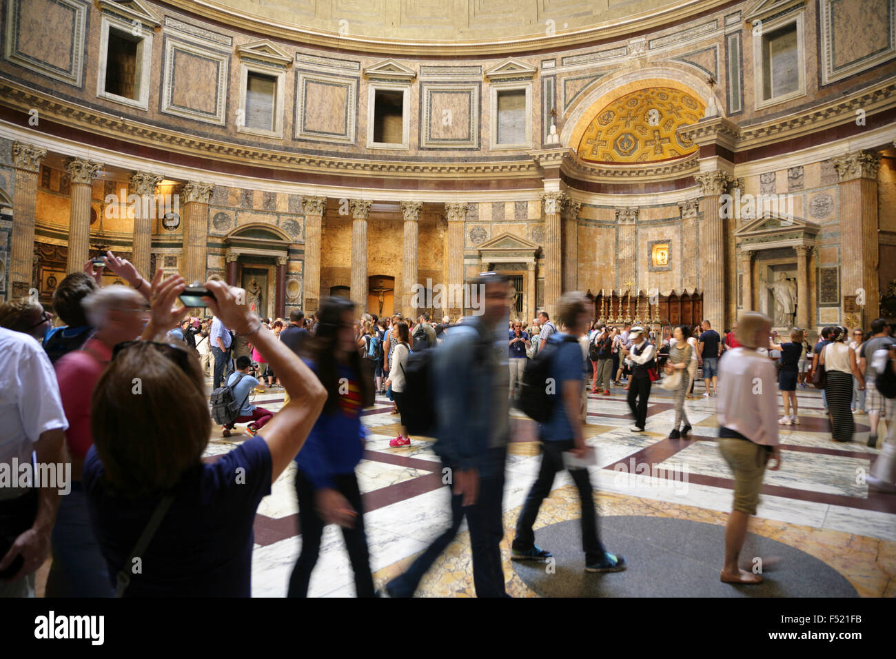 Tourist photographing the interior of the Roman Pantheon, Rome, Italy ...