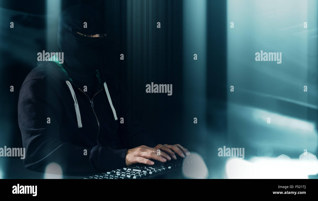 Computer programmer typing on keyboard, hacker futuristic cybercrime ...