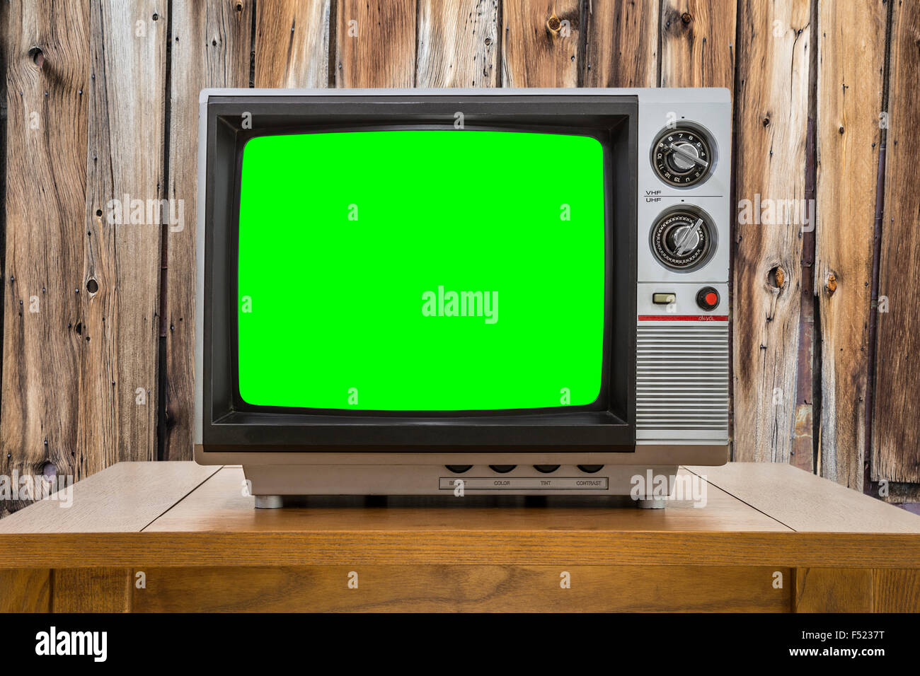 Vintage portable television with chroma key green screen and rustic ...