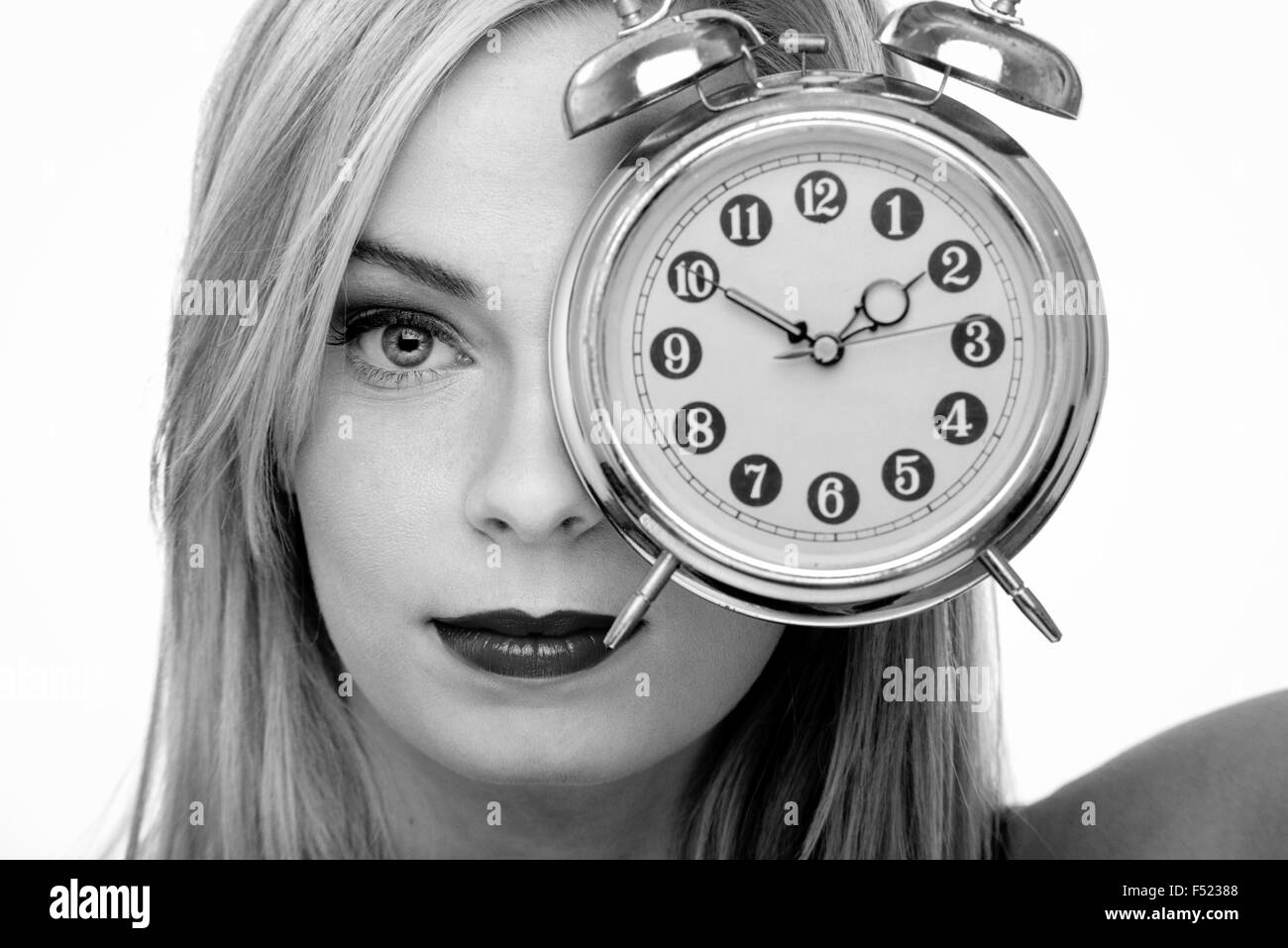 Woman clock time Black and White Stock Photos & Images - Alamy