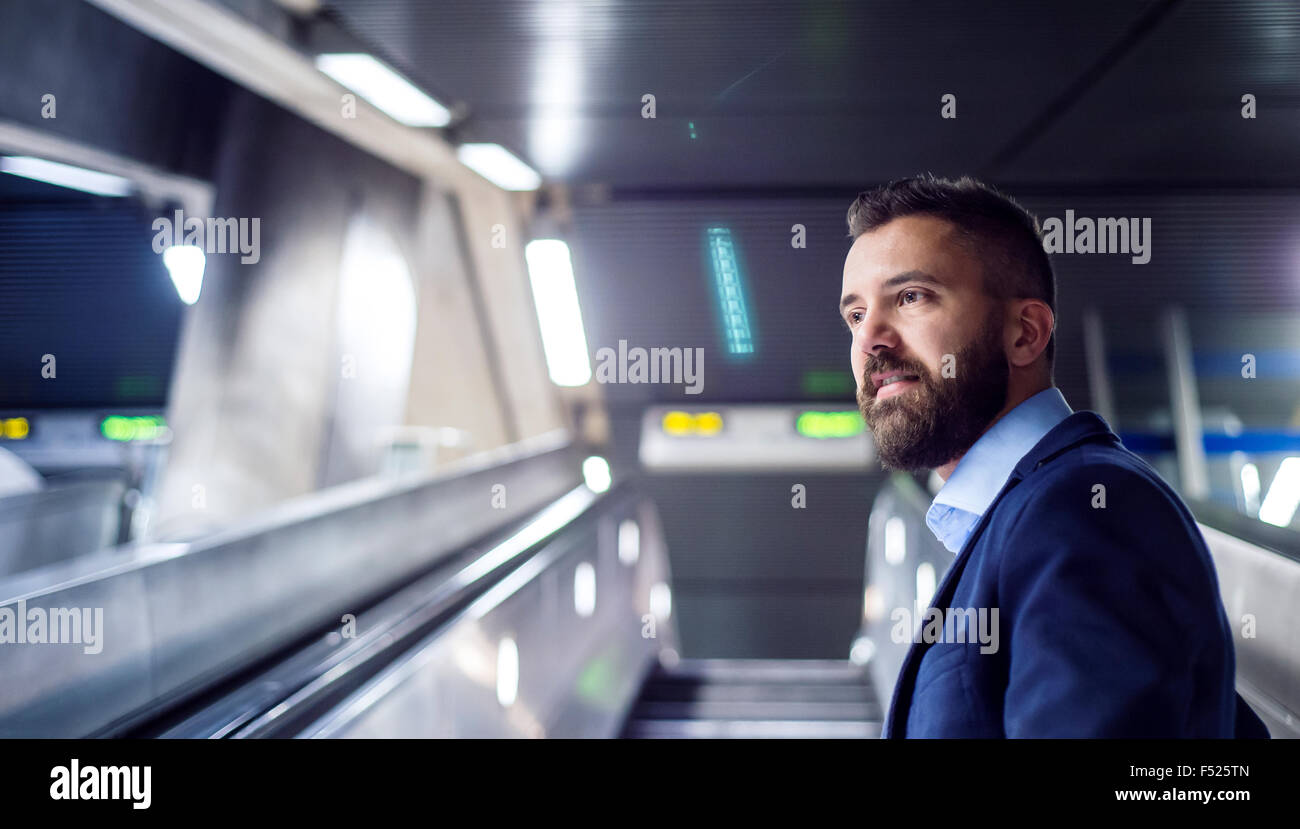 Businessman in subway Stock Photo - Alamy