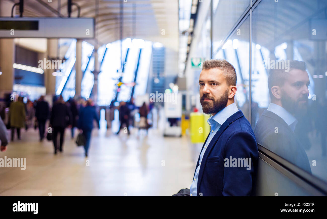 Businessman in subway Stock Photo - Alamy