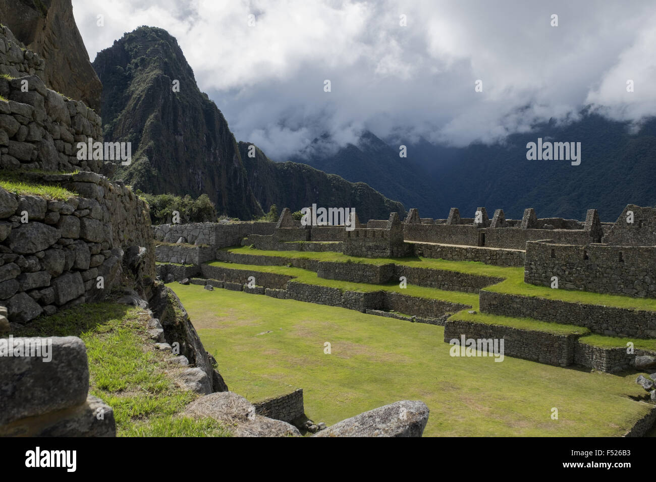 Building on terraces facing the main square of Machu Picchu Stock Photo ...