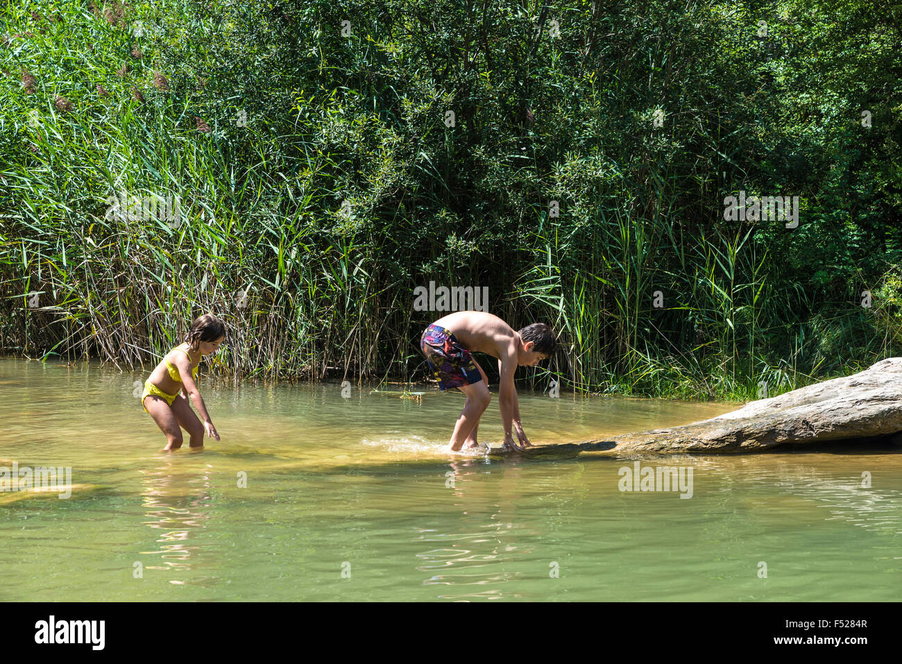 Boy falling into water hi-res stock photography and images - Alamy