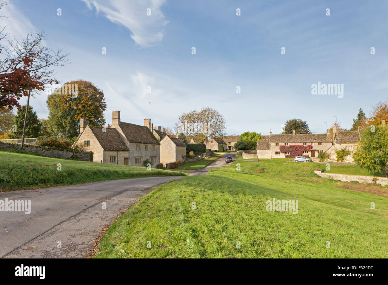 The village of Little Barrington in autumn light, the Cotswolds ...