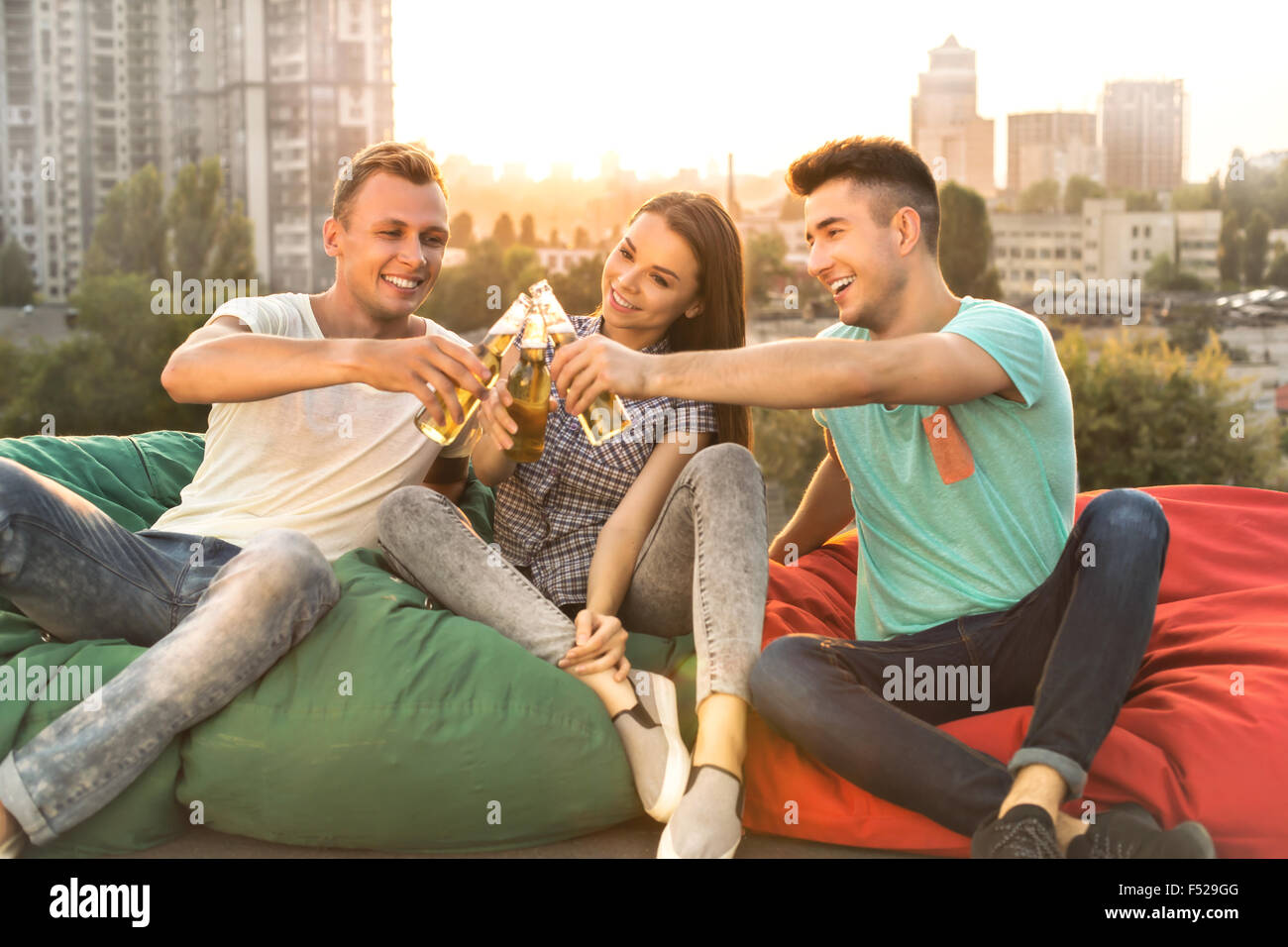 Friends having party at roof Stock Photo - Alamy