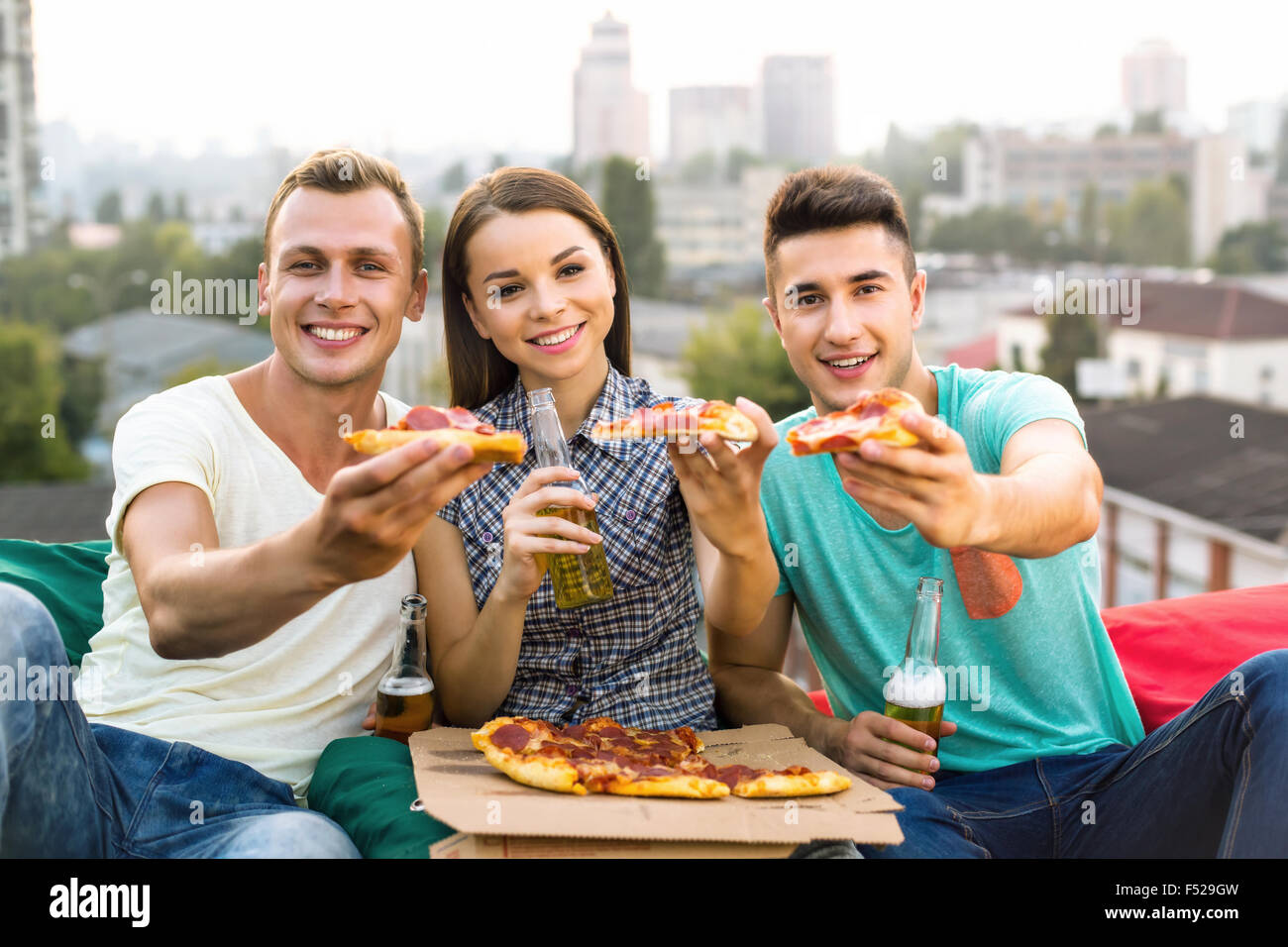Friends having party at roof Stock Photo - Alamy