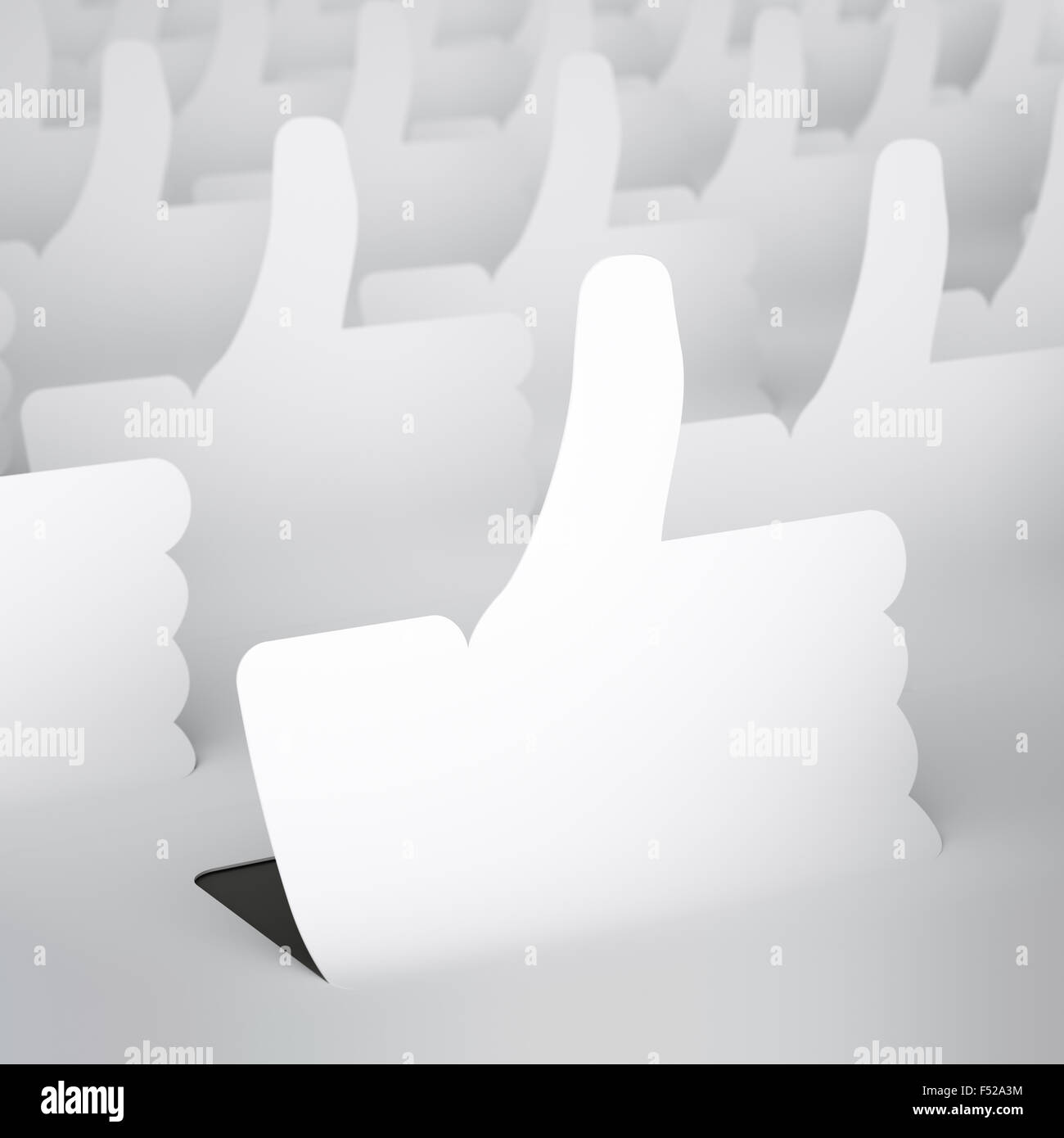 Paper cut-out thumbs up signs Stock Photo - Alamy