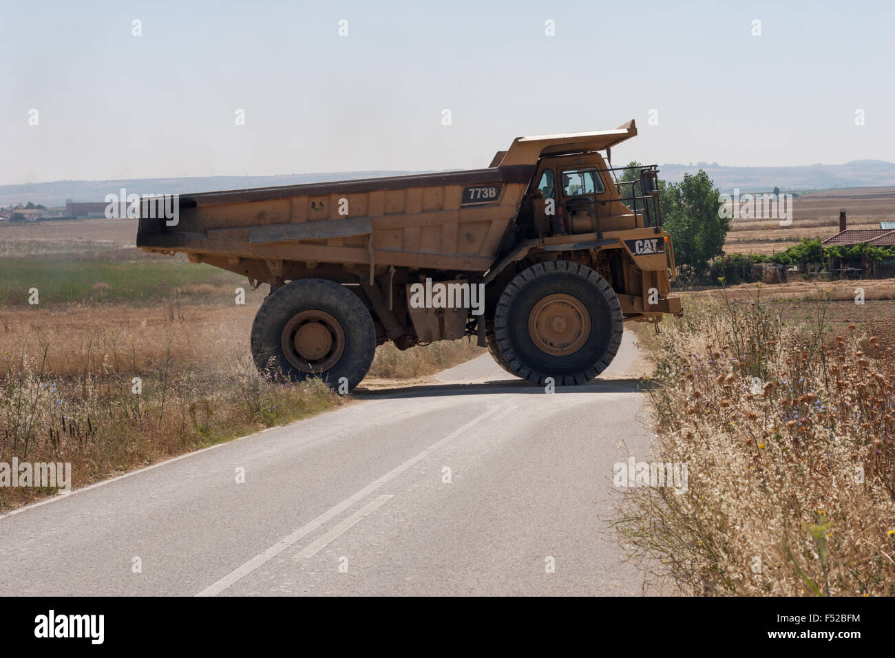 Mining truck, crossing the road Stock Photo - Alamy