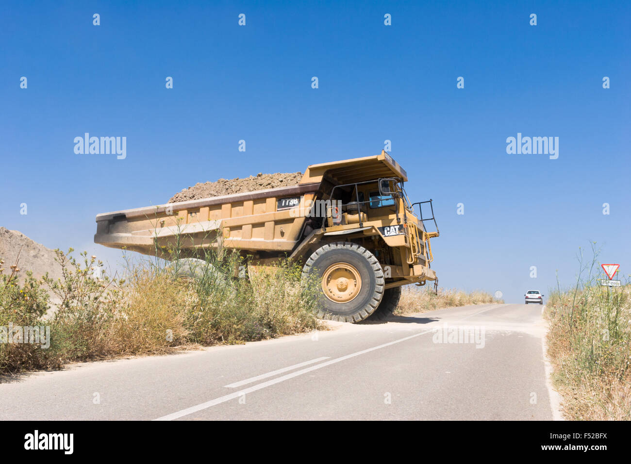 Mining truck, crossing the road Stock Photo - Alamy