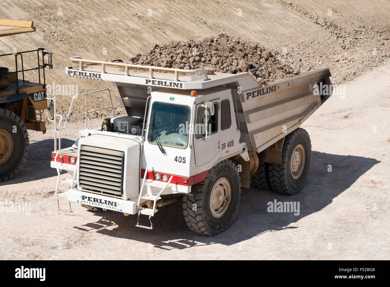 Mining truck in action Stock Photo - Alamy