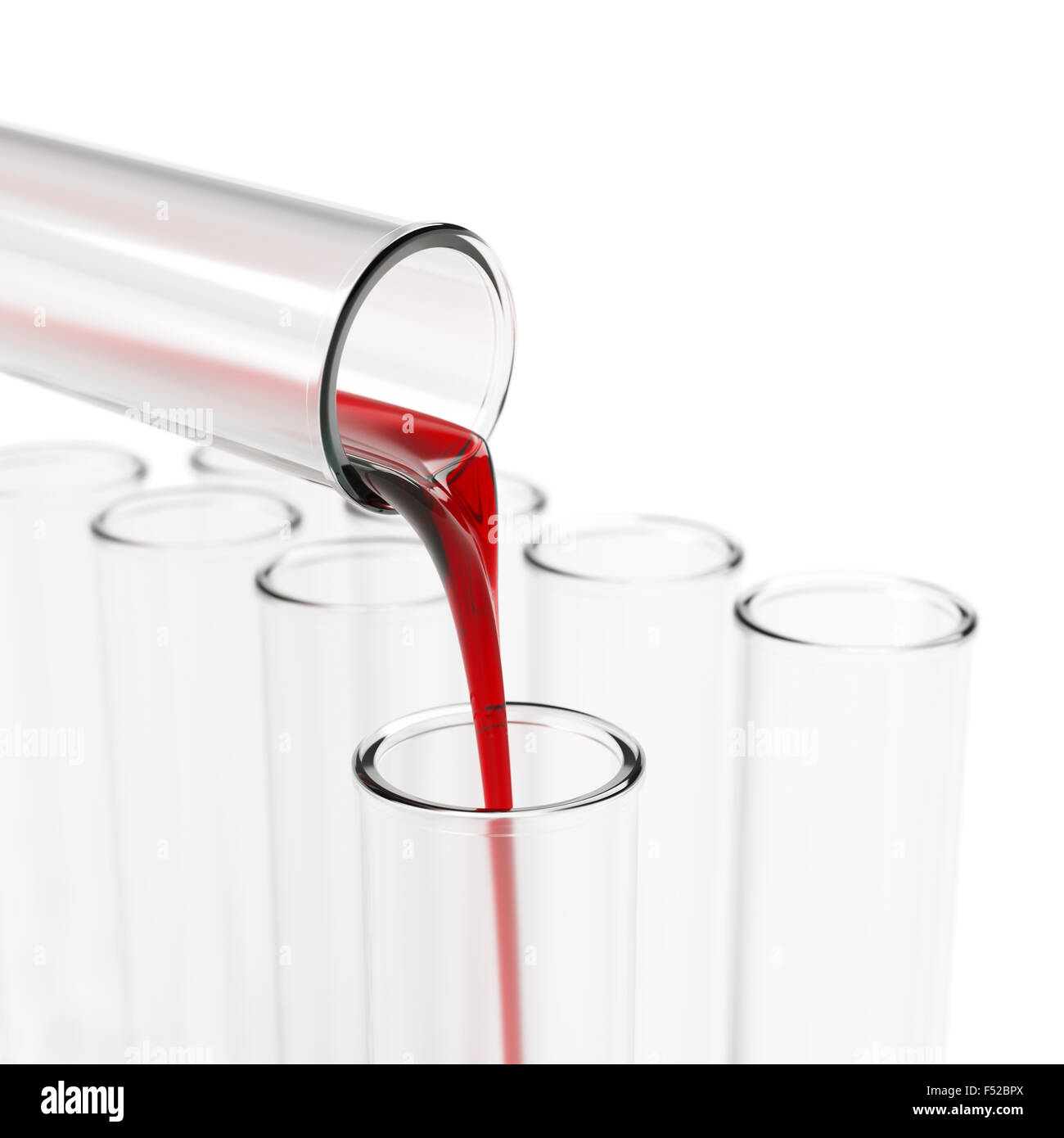 Pouring liquid in laboratory glassware on white background Stock Photo ...