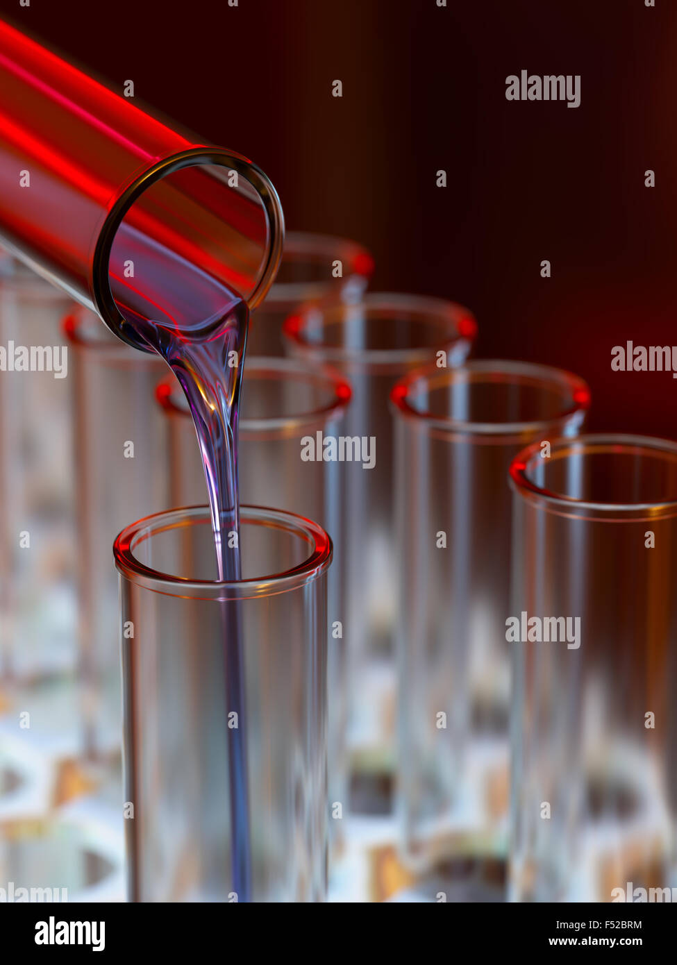 Pouring blue liquid in test-tube close up Stock Photo - Alamy